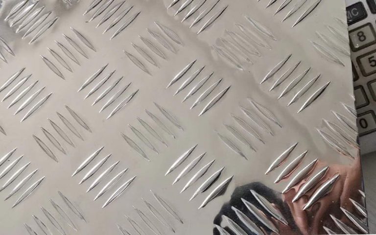 Embossed aluminum metal sheet coil as a vehicle decorative material